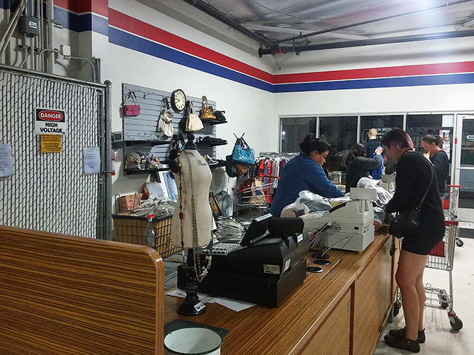 The checkout counter&mdash;final gateway between thrift store dreams and reality. Friendly staff ready to ring up your treasures while you already plan tomorrow's return visit.