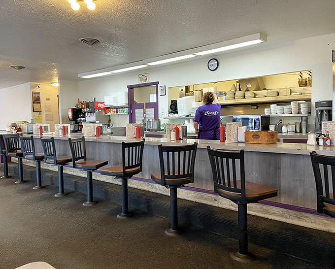 The counter seating&mdash;where solo diners become temporary neighbors and coffee refills flow like conversation. Diner diplomacy at its finest.