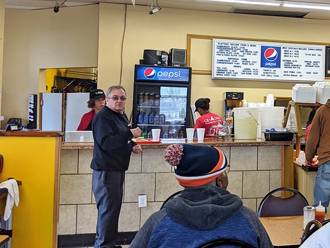 The counter where magic happens, where orders are called out in a rhythm as familiar and comforting as your grandmother's voice on Sunday morning.