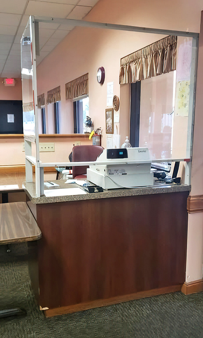 The command center where breakfast dreams become reality. That plexiglass divider is new, but the warm welcome behind it remains deliciously unchanged.