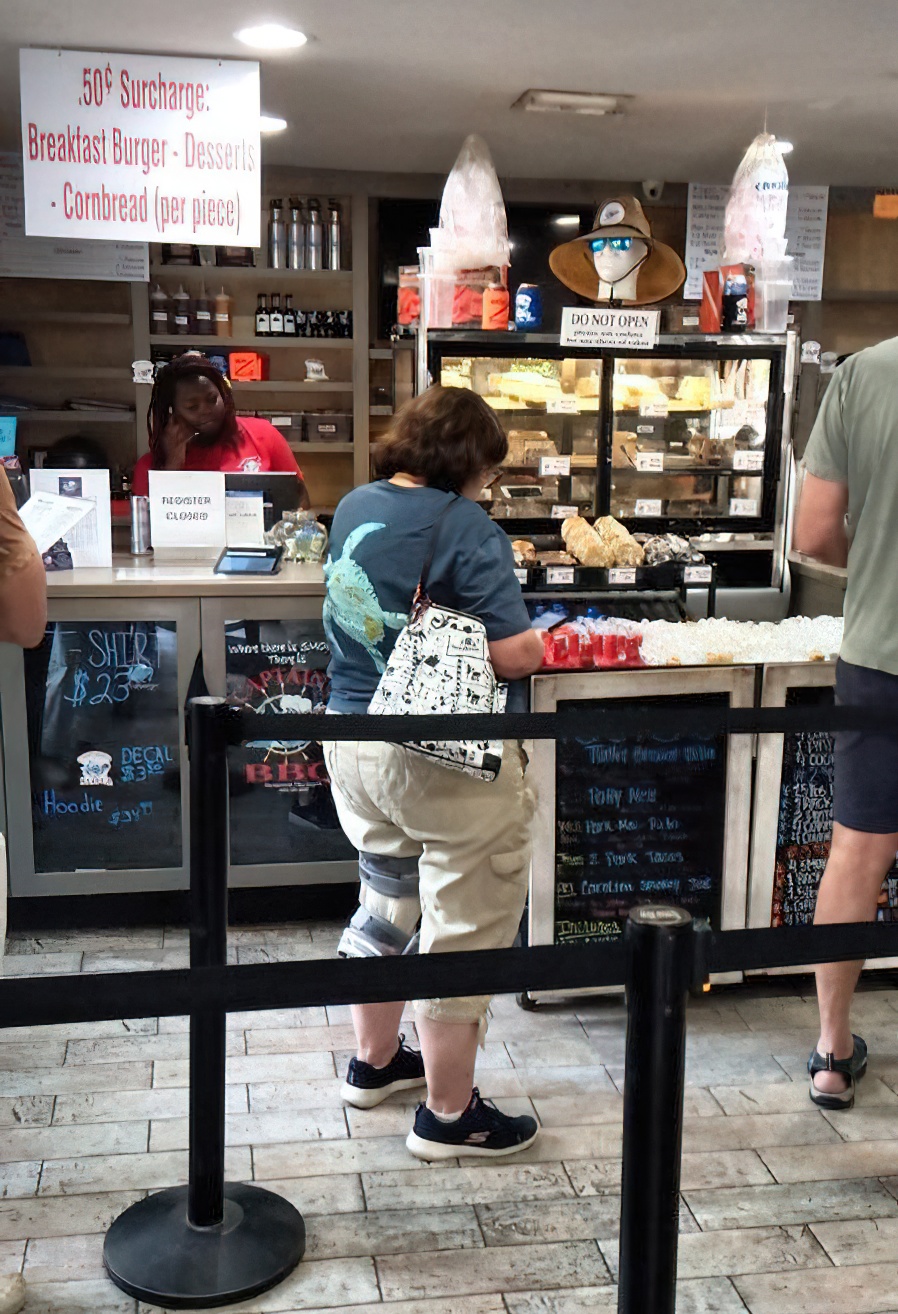 The ordering counter – where dreams come true and diet plans go to die in the most delicious way possible.