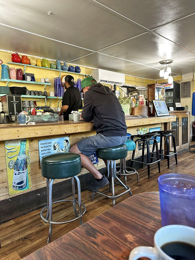 The counter seats&mdash;where solo diners become regulars and the coffee flows as freely as the conversation. This is where breakfast becomes community.