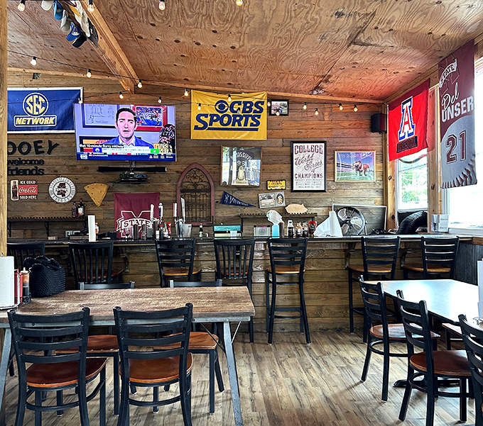 The wood-paneled sports haven where SEC football and BBQ create the perfect Mississippi marriage of passions.