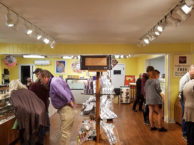 Patrons pondering life's sweetest decisions under warm lighting. The universal expression of dessert anticipation knows no age limit.