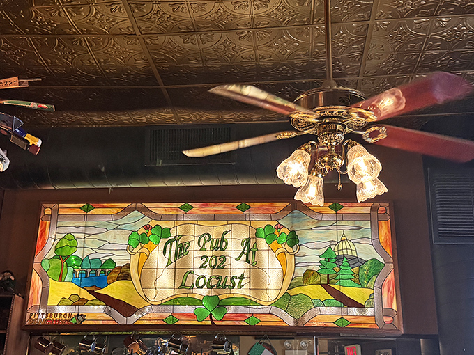 Ornate tin ceiling tiles and vintage fixtures transport you to another era, where conversation flows as freely as the spirits below.