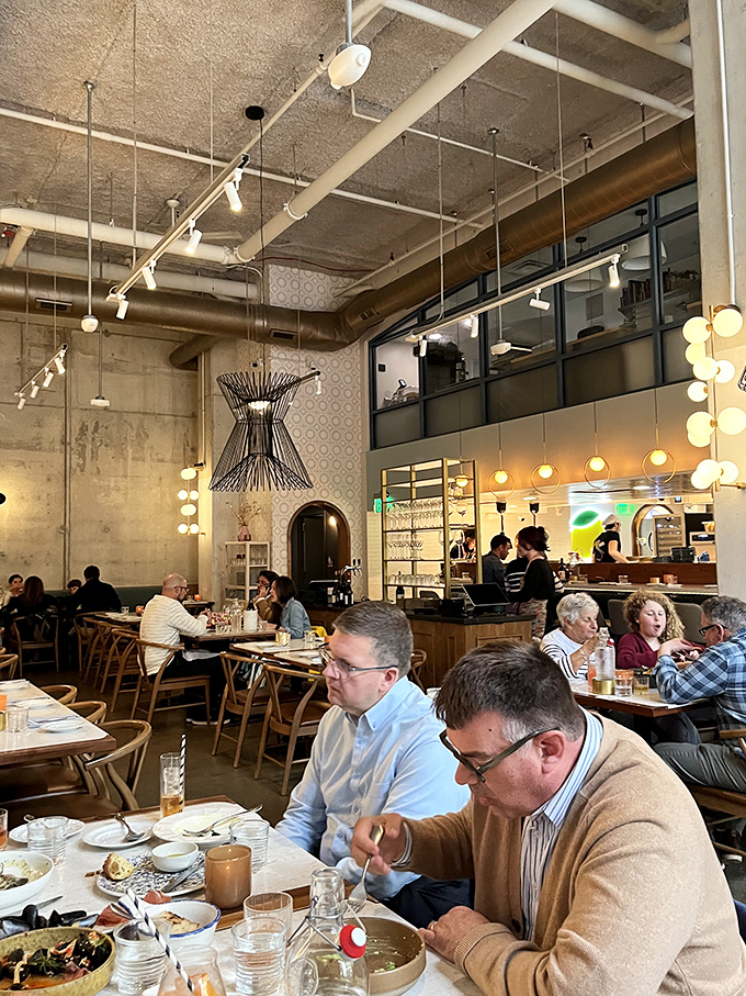 The dining room buzzes with the symphony of satisfaction&mdash;forks meeting plates, glasses clinking, and the universal sound of people having a genuinely good time.