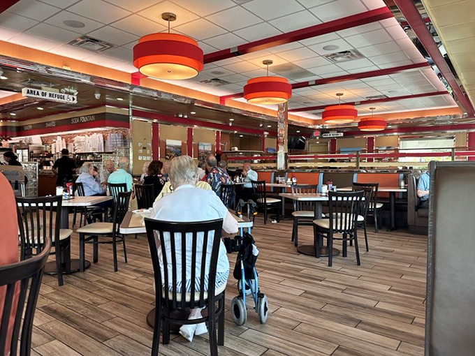 The dining room hums with conversation and silverware clinks&mdash;a symphony of satisfaction conducted by hungry patrons and efficient servers.