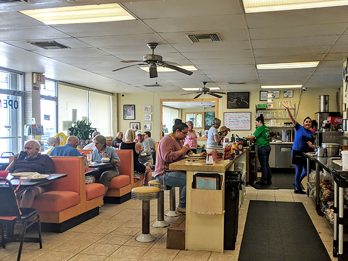 Where locals and visitors break bread together. Notice how everyone's focused on their plates? That's the universal language of good food.