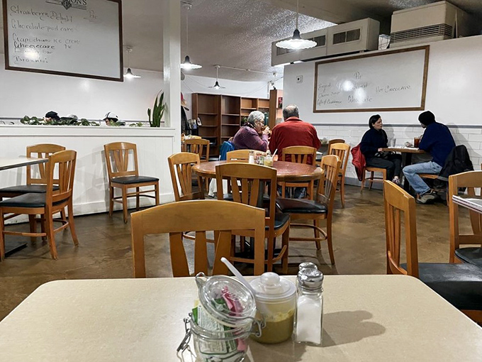 A quiet moment captured in the dining room&mdash;where strangers become neighbors over shared appreciation of proper deli fare.