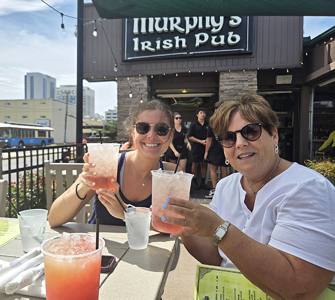 Outdoor drinks at Murphy's&mdash;where sunshine, good company, and colorful cocktails combine to create those perfect "wish you were here" moments.