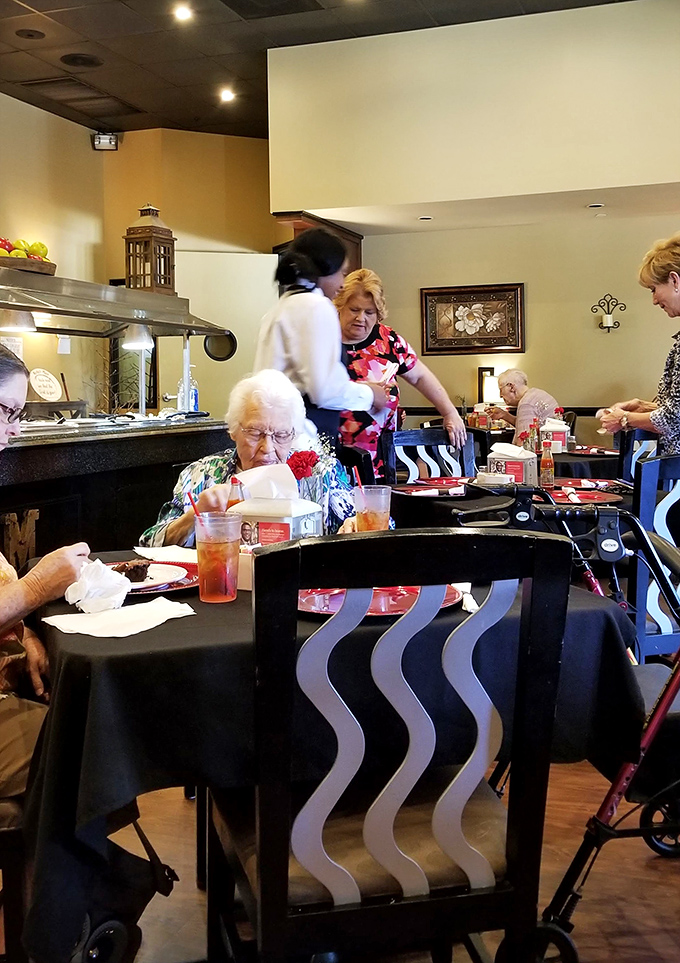 The dining room buzzes with the energy of people united by one noble purpose: the pursuit of exceptional Southern cooking and sweet tea.