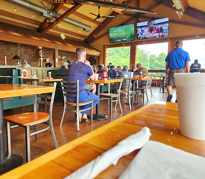 The dining room buzzes with the universal language of BBQ appreciation &ndash; napkins at the ready, conversations paused mid-bite for maximum enjoyment.