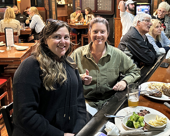 The true measure of a great restaurant: the genuine smiles of people making memories over meals that will become stories later.
