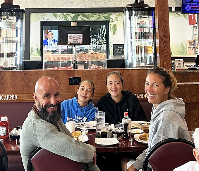 Happy faces around the table tell the whole story - this is where memories happen.