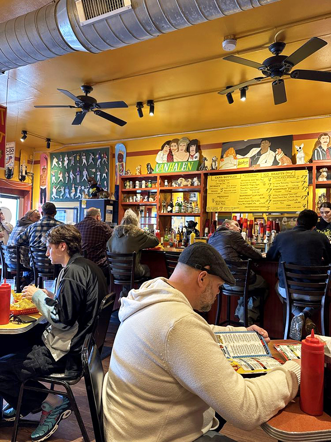 Where strangers become friends united by the universal language of hot dog appreciation. The menu demands full attention before making life-altering decisions.