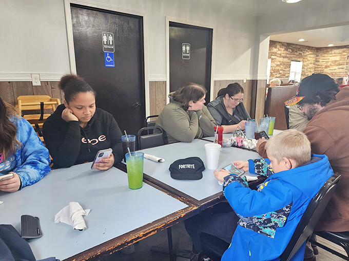 Families gather around these tables where breakfast becomes a cherished ritual worth repeating weekly. 