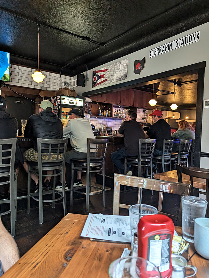 The bar area buzzes with regulars who've claimed their territory – where everybody might not know your name yet, but they'll nod approvingly at your food choices.