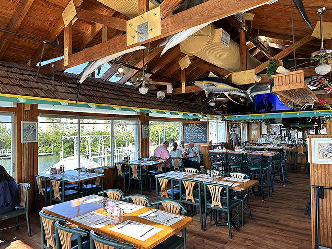 Wooden beams, water views, and tables awaiting hungry patrons &ndash; Billy's dining room is coastal Florida in architectural form.