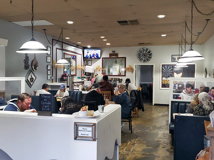 The buzz of conversation and clinking silverware creates the perfect breakfast symphony, with every table conducting its own delicious movement.