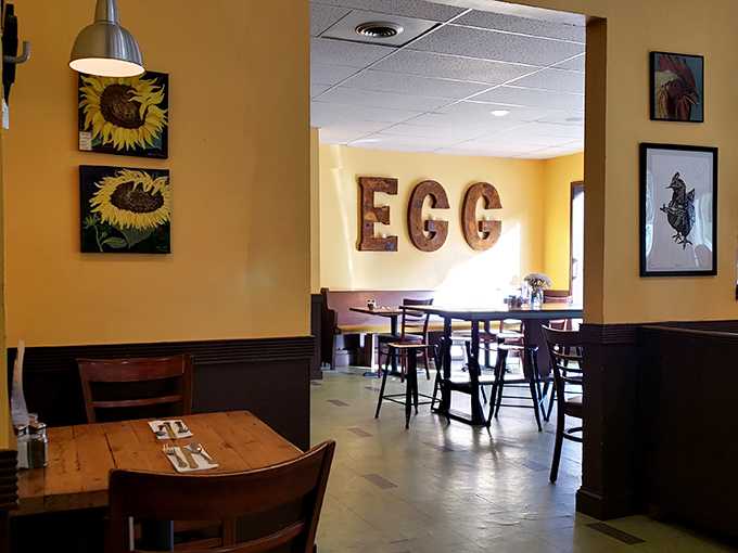 Sunflower art and rustic "EGG" letters announce exactly what this place worships&mdash;the humble breakfast staple elevated to art form.