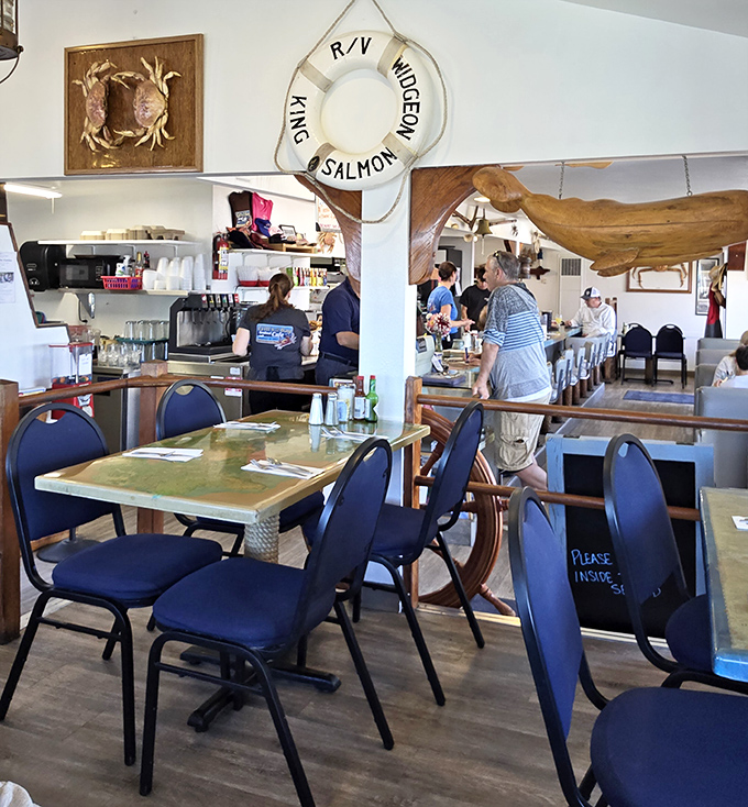 Nautical touches like life preservers and ship wheels transform dining here into a maritime adventure, minus the seasickness.