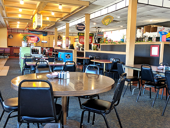 Round tables and straight-backed chairs create the perfect setting for both solo diners and families gathering for Sunday breakfast traditions.