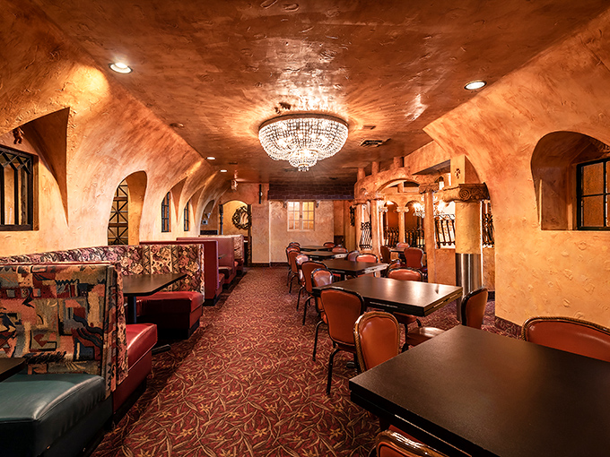 Dining under warm copper ceilings and crystal chandeliers—where everyday meals transform into memorable occasions without trying too hard.