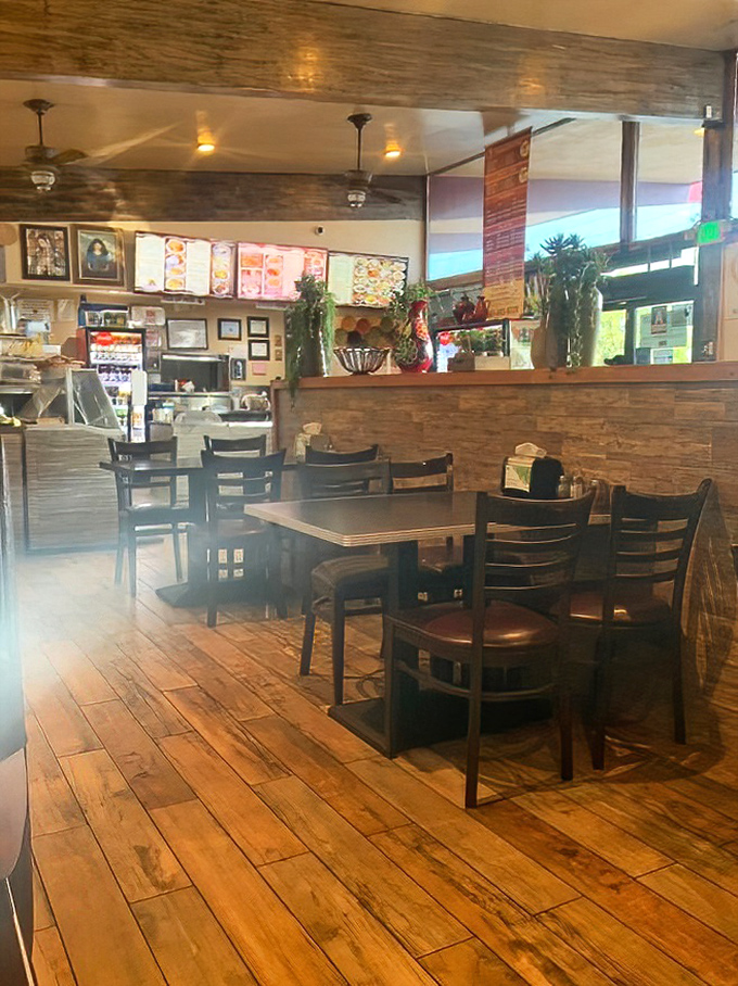 The warm wood tones and simple furnishings of the dining area let you focus on what really matters: the explosion of flavors on your plate.