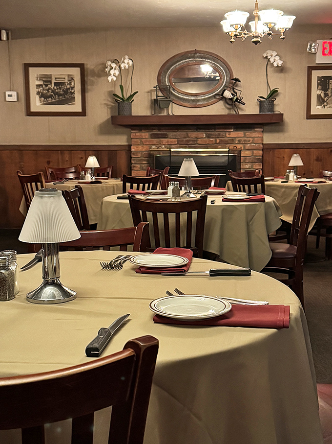 White tablecloths, warm lighting, and a fireplace create the kind of dining room where memories are made between bites of perfectly grilled beef.