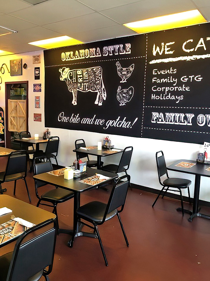 The dining area's chalkboard wall showcases meat diagrams that serve as both decoration and education. BBQ class is now in session.