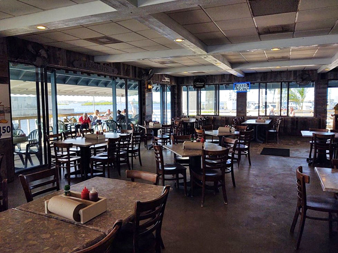 The dining room offers panoramic water views that rival the food for your attention. Every table feels like the captain's table.