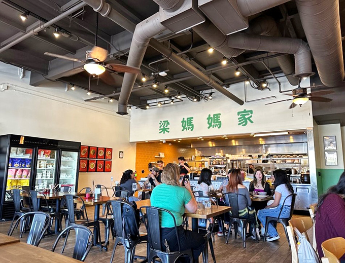 A bustling dining room where strangers become friends over shared recommendations and the universal language of "mmmmm."