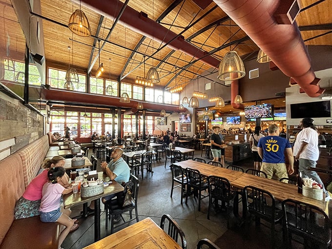 The dining room's got that "airplane hangar meets cozy lodge" energy that somehow makes perfect sense with ribs.