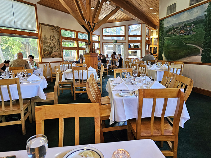 White tablecloths, wooden chairs, and sunlight streaming through windows&mdash;this dining room sets the stage for memories made between courses.