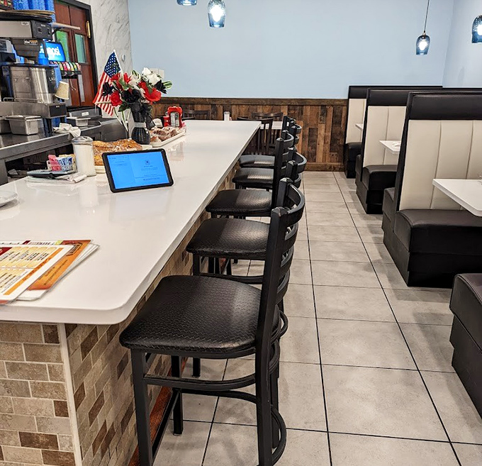 The counter seating&mdash;where solo diners become regulars and the staff eventually knows your order before you've fully settled onto your stool.