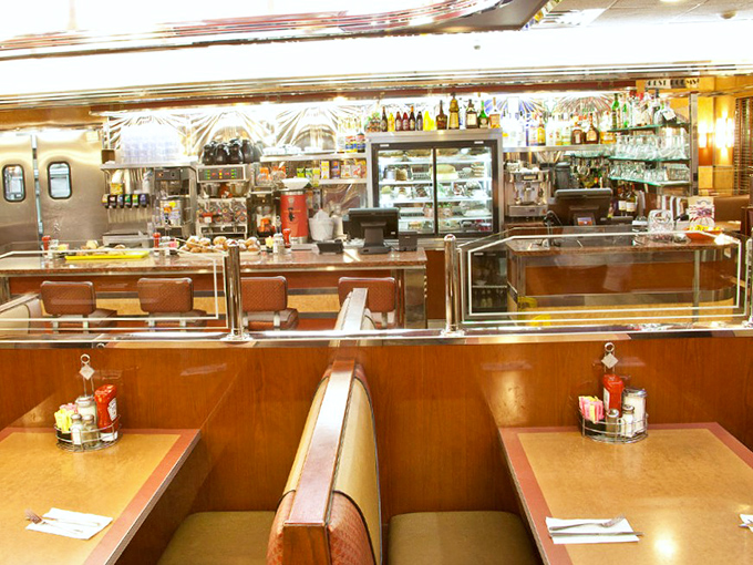 The counter seats: where solo diners become food critics, regulars become mayors, and everyone gets a front-row view of short-order wizardry.