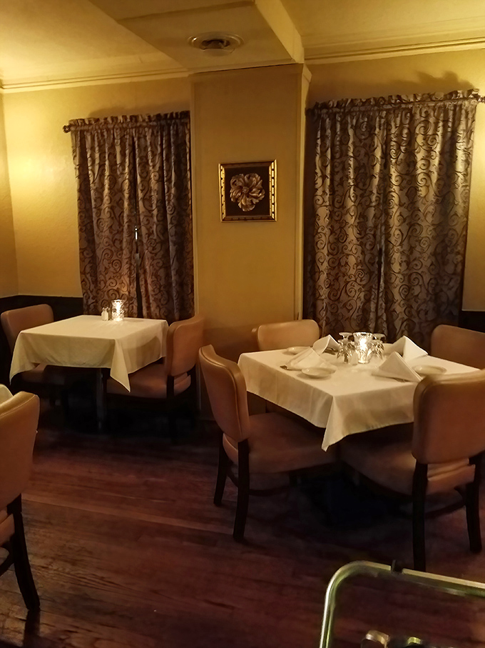 Intimate dining spaces with elegant drapery create the perfect backdrop for conversations that last well into the evening.