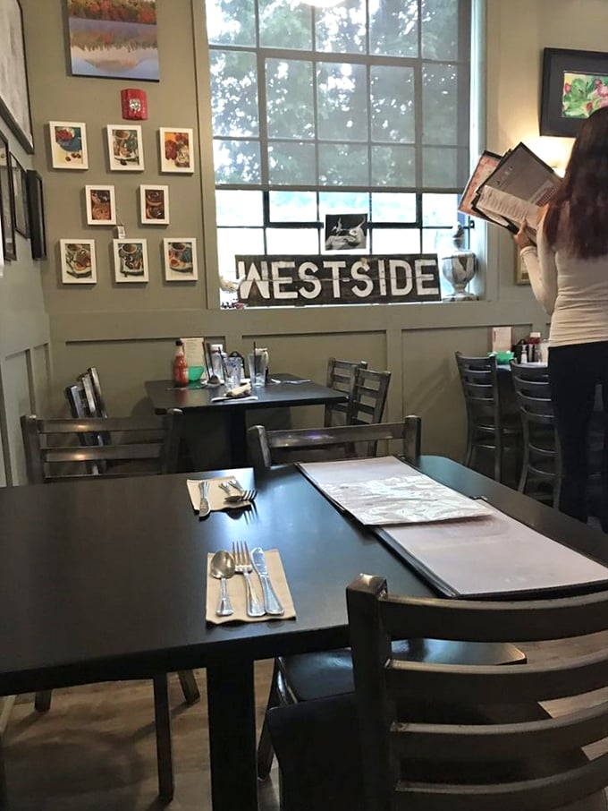 The dining area offers a more contemporary space for those who prefer tables to booths, but the comfort food promise remains.