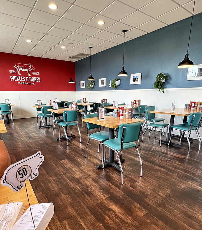 Retro diner meets modern BBQ joint. Those turquoise chairs have witnessed countless BBQ epiphanies and sauce-stained smiles.