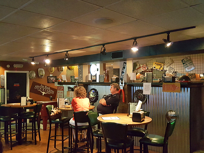The dining area's corrugated metal dividers and casual seating create that perfect "everybody knows your name" atmosphere.