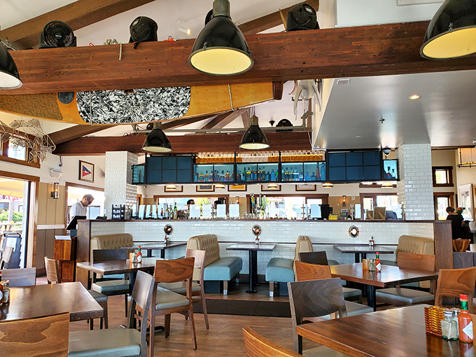 Wooden beams, nautical decor, and tables positioned for maximum view-gazing&mdash;this dining room knows exactly what it's doing.