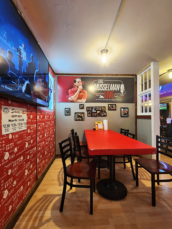 Sports on TV, red walls covered in memorabilia, and tables ready for serious eating—this is where barbecue dreams and Razorback victories are celebrated equally.