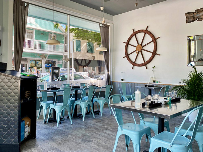 That ship's wheel isn't just decor&mdash;it's steering this dining room straight into the heart of Key West's maritime heritage.