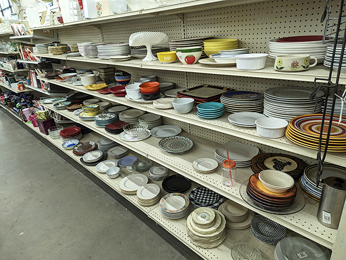Plates and bowls in every pattern imaginable line these shelves. That yellow serving dish could be the star of your next dinner party.