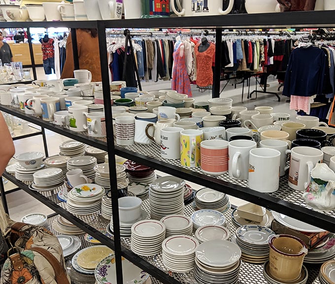 Mugs and plates stand in formation like ceramic soldiers, ready to march into new kitchens and create memories around different tables.