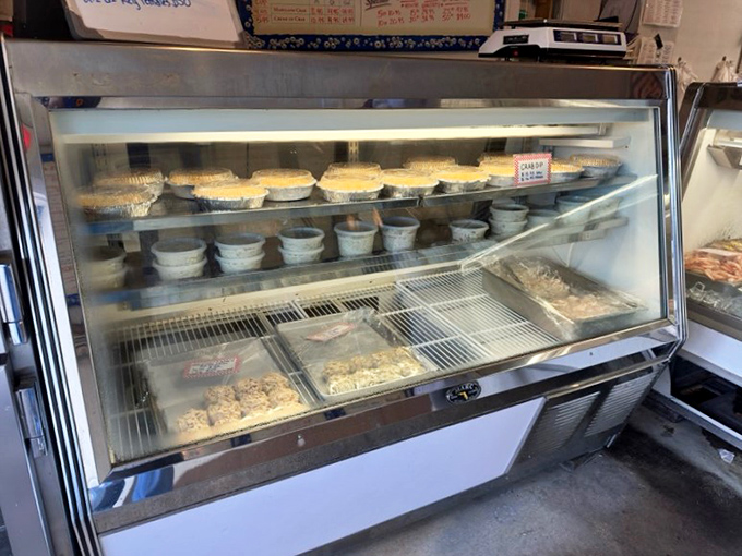 The display case of dreams&mdash;where crab cakes await their lucky new owners. Each container holds enough crab meat to make a mermaid jealous.