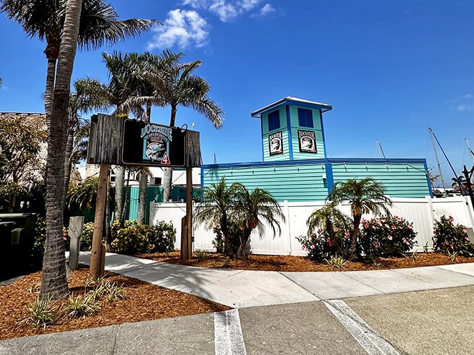 Dockside Waterfront Grill's cheerful blue exterior promises seafood that was swimming this morning and sunset views that never get old.