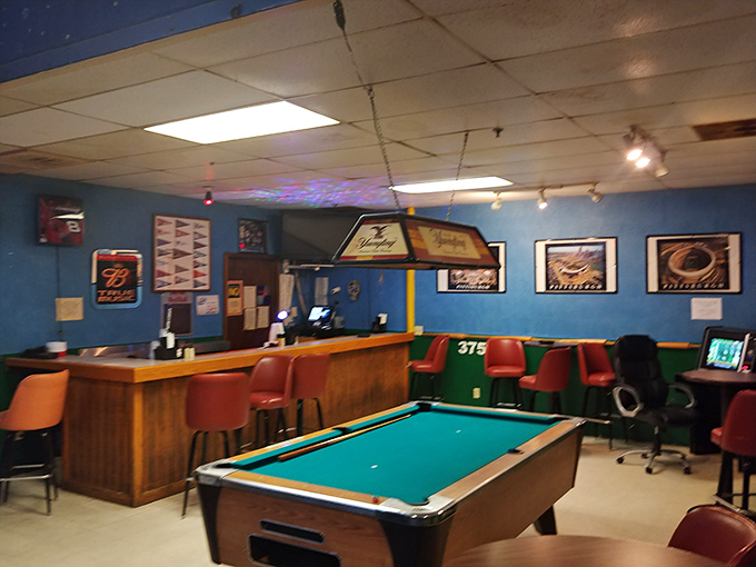Double Play Sports Bar offers that perfect small-town watering hole vibe, where the pool table's felt is slightly worn from decades of friendly competition.