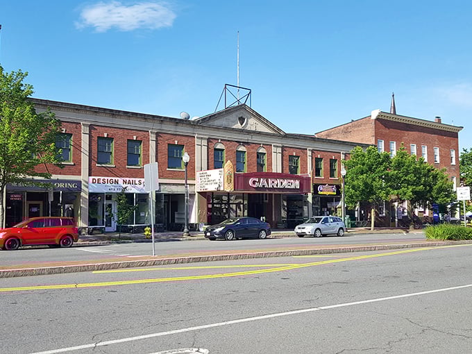 The Garden Theater marquee anchors a downtown where you can still watch a movie without taking out a second mortgage for popcorn.
