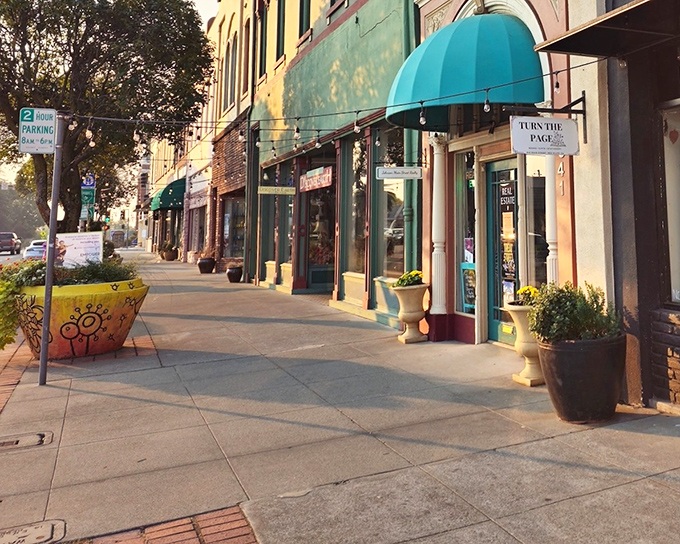 Downtown storefronts with character instead of chains, where awnings in cheerful colors invite you to browse without the pressure of big-city retail.